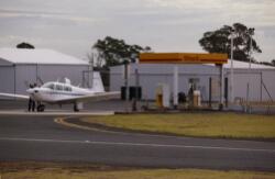 A private plane refuels at a Shell Avgas pump at the general aviation ...