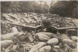 A wrecked Corsair fighter plane on a scrap heap, ca. 1940s [picture].