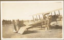 Darcy Rees (left) with passenger next to Horrie Miller's de Havilland ...
