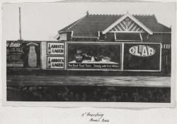 Billboards advertising Abbots Lager and Bonox along railway lines ...